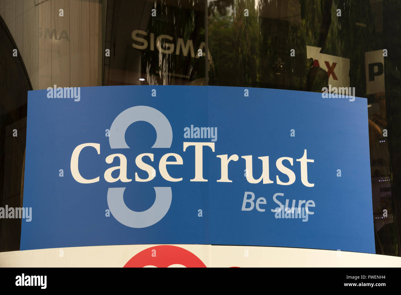 A poster displaying a poster,' CaseTrust' on a shop/ retailer window in ...