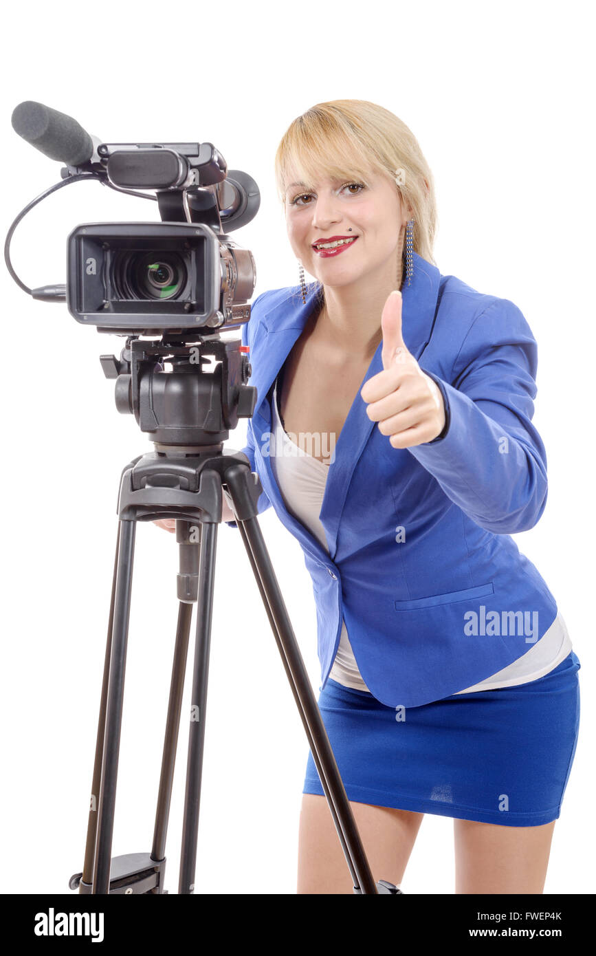a beautiful young woman with blue suit and professional video camera ...