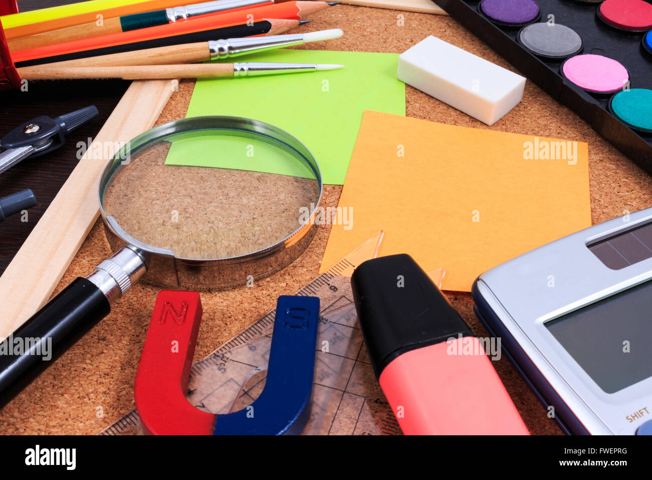 Office table desk with set of tools for creative art work on a white ...