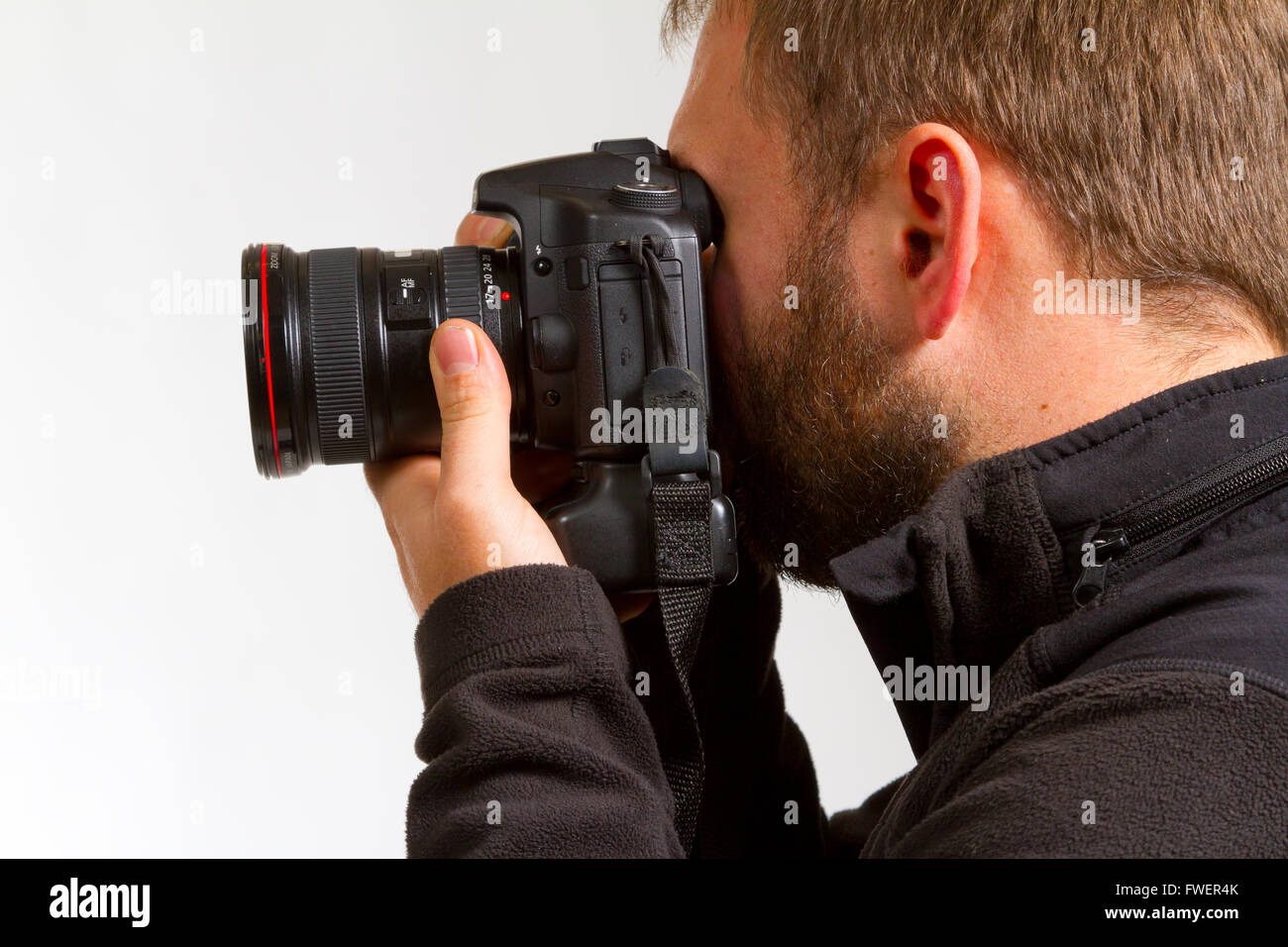 Photographer taking photos canon camera hi-res stock photography and ...