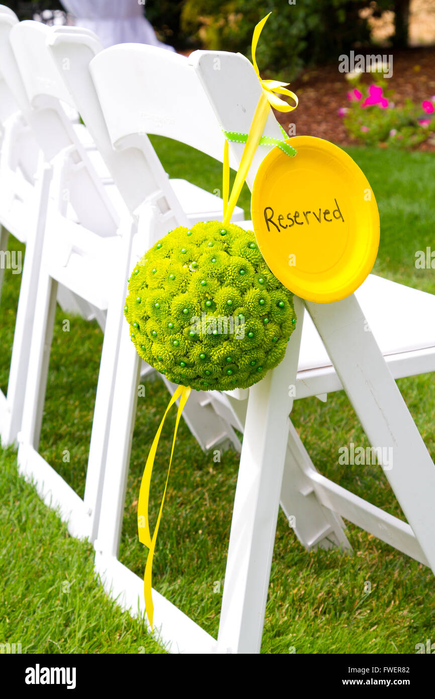 Flowers are placed together to create these unique green floral balls ...