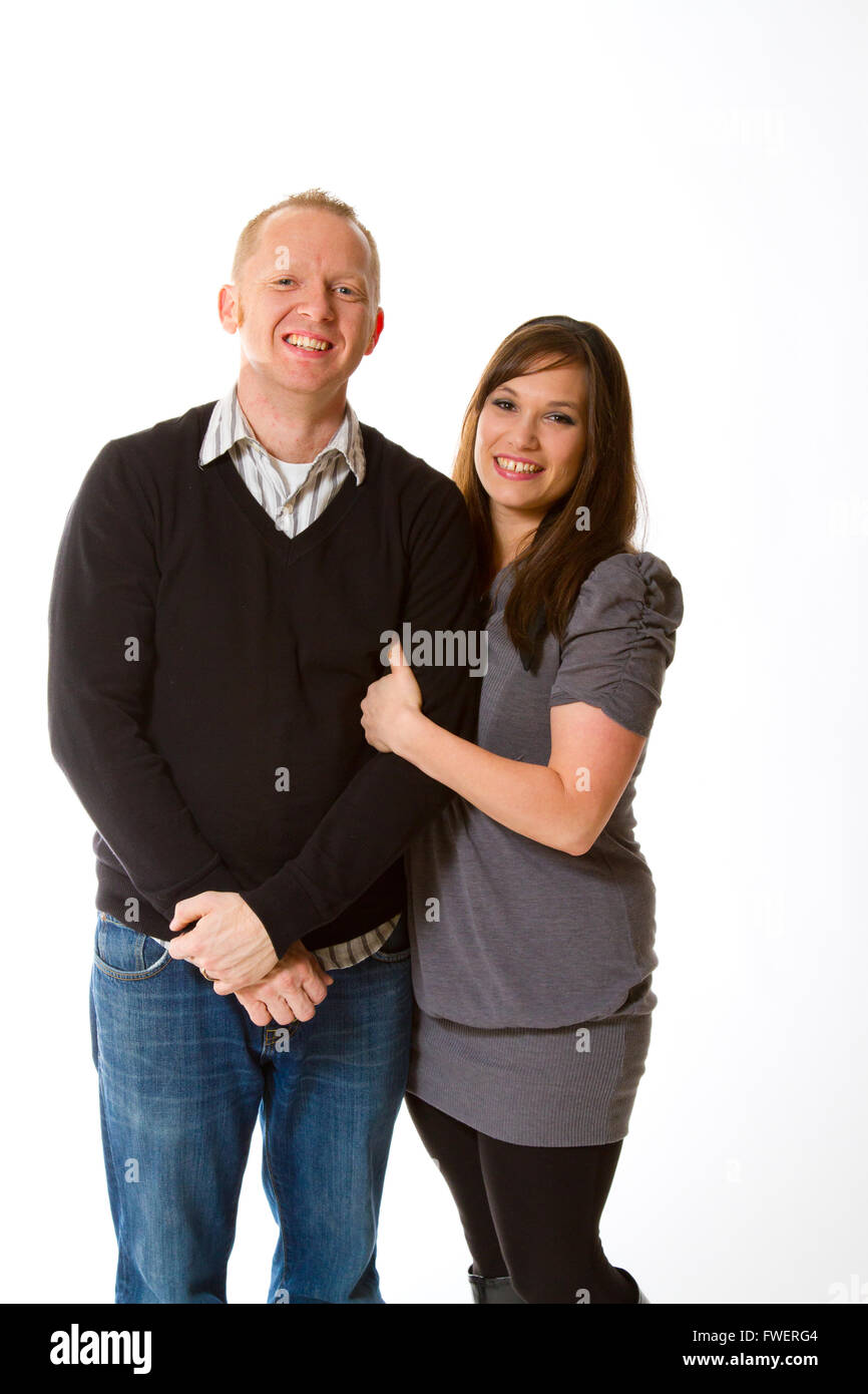 A couple in the studio on an isolated white background for a portrait ...