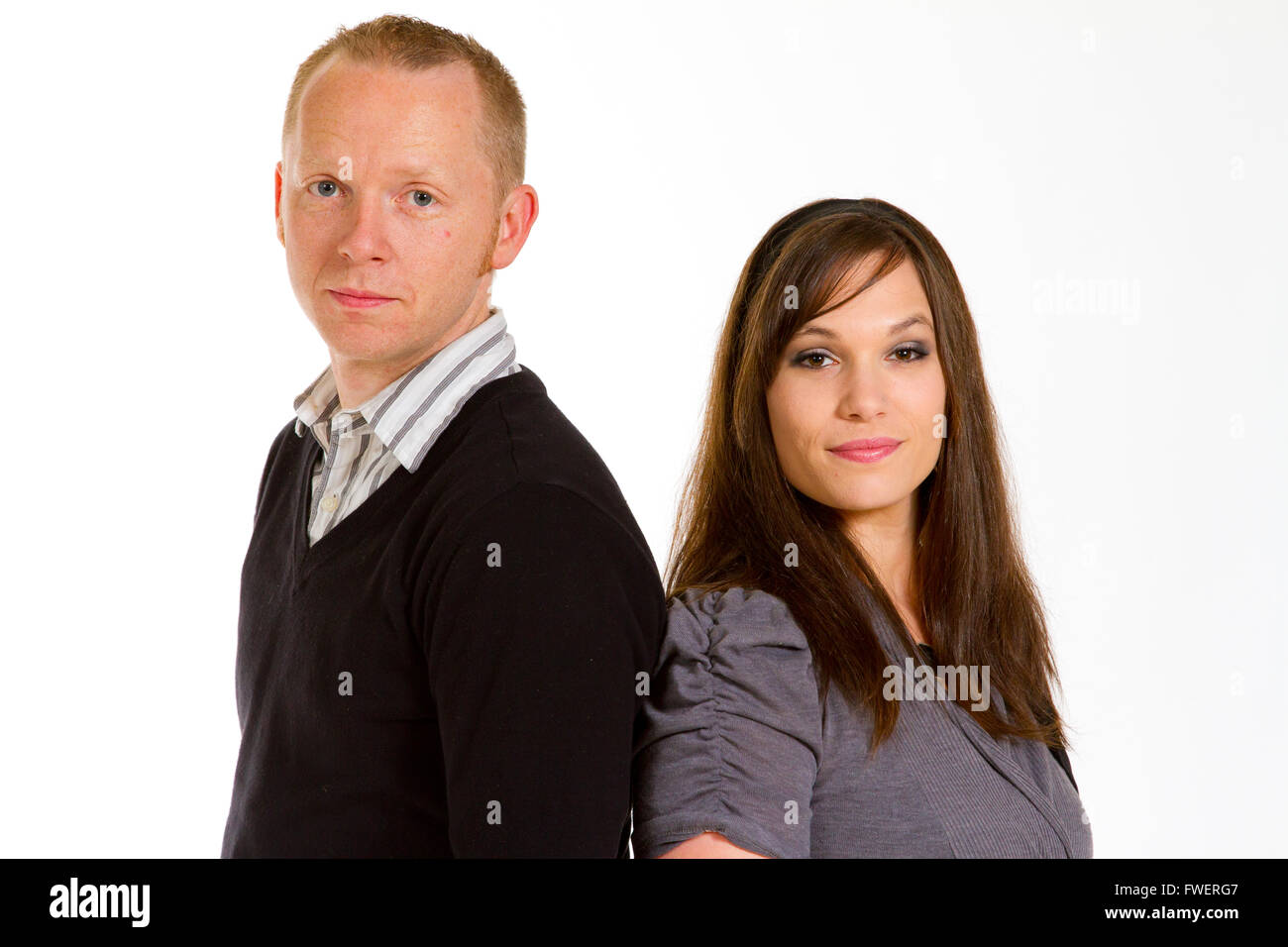 A couple in the studio on an isolated white background for a portrait ...