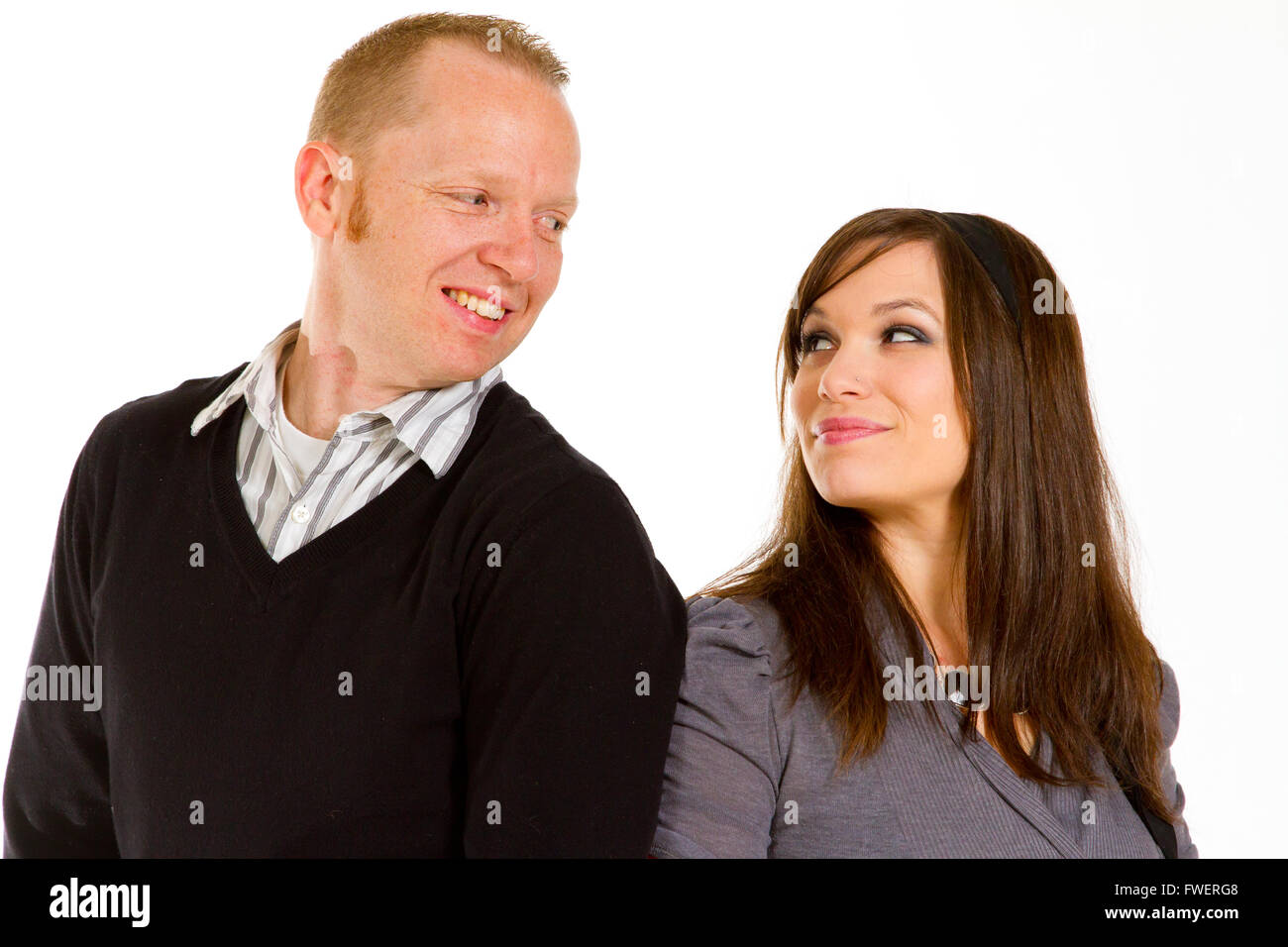 A couple in the studio on an isolated white background for a portrait ...