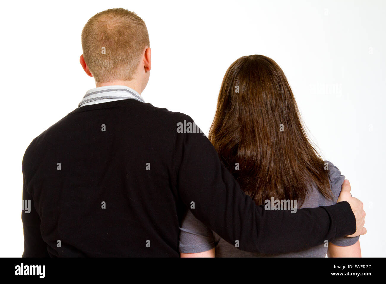 A couple in the studio on an isolated white background for a portrait ...