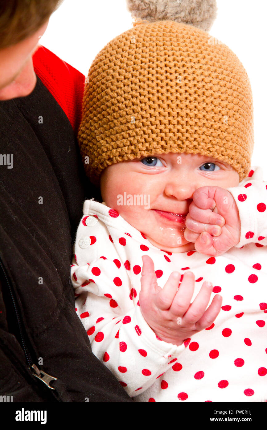 A newborn baby girl with her parents in the studio for a portrait Stock ...