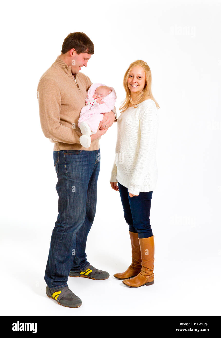Family with a newborn baby Cut Out Stock Images & Pictures - Alamy