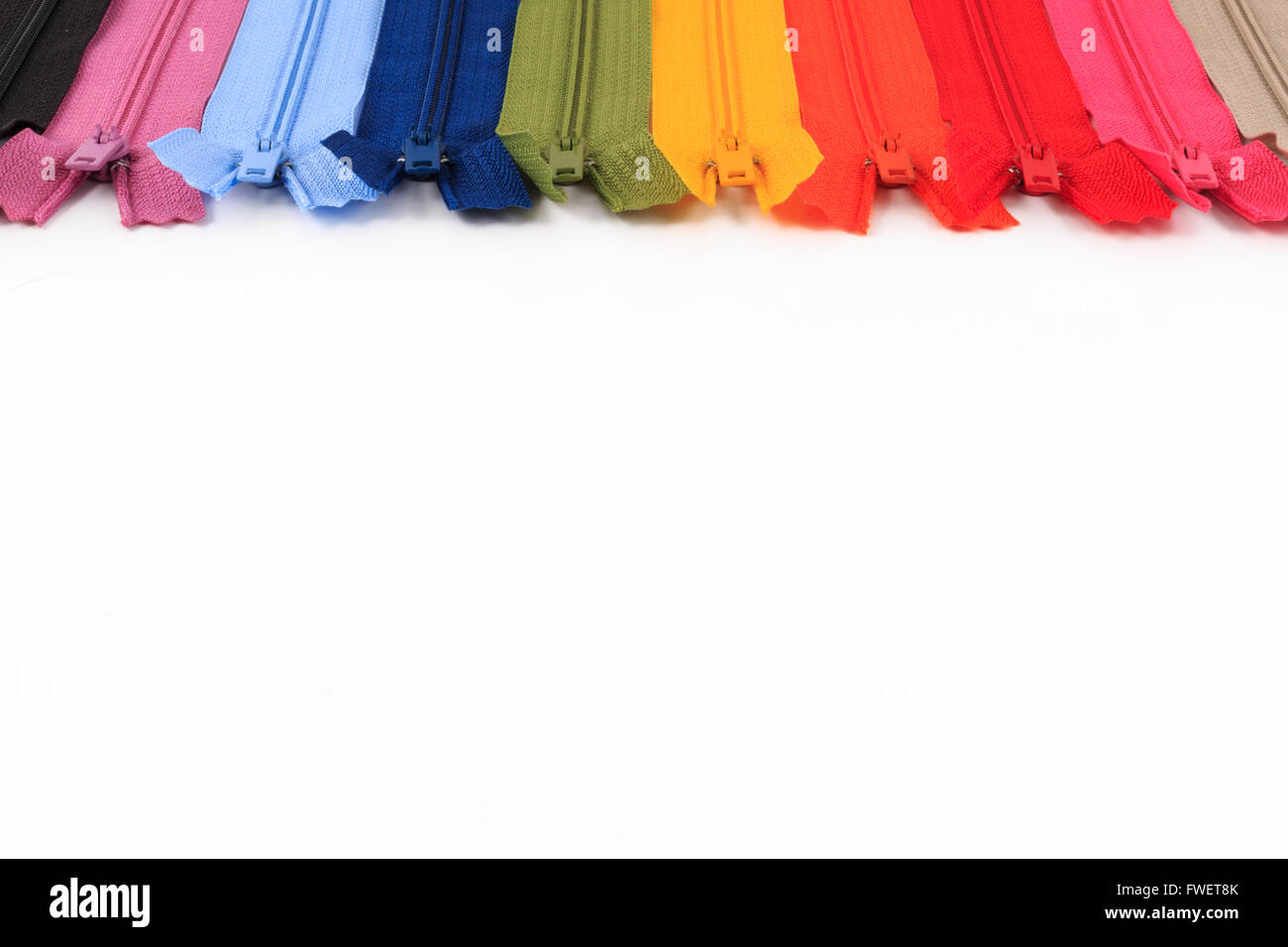 Colorful Zippers in different colors on white background Stock Photo ...