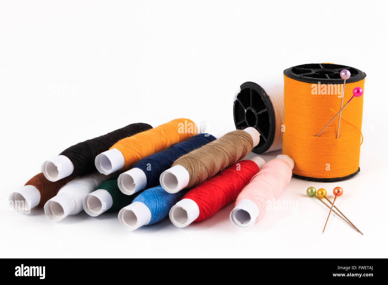 Spool of thread with needle, pins, zippers colorful sewing bobbin ...