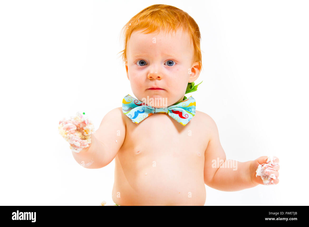 Baby boy gets eat cake hi-res stock photography and images - Alamy