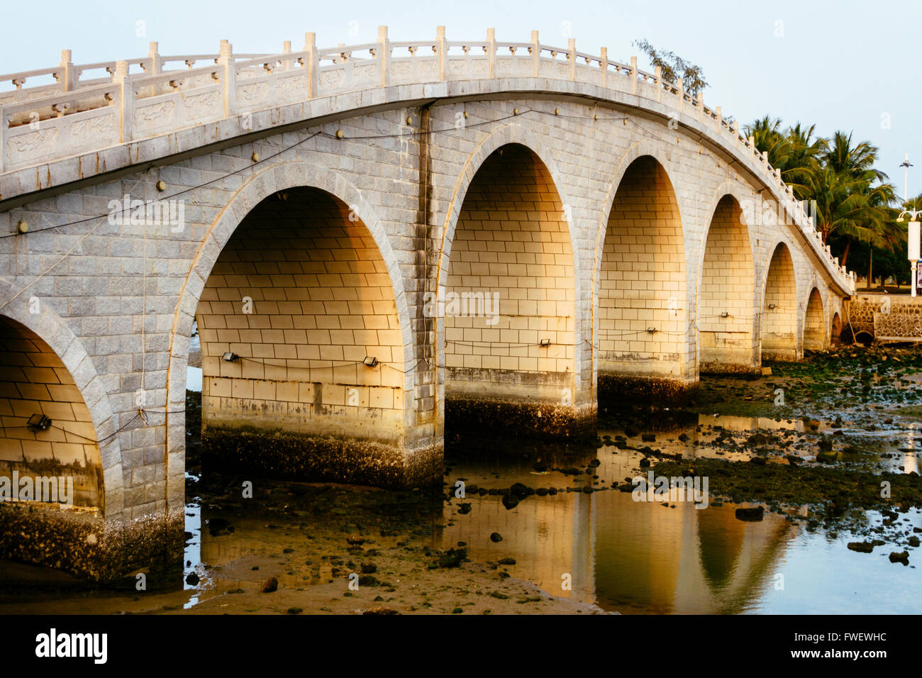 Haikou, Hainan Island, China - The view of a stone arch bridge at ...