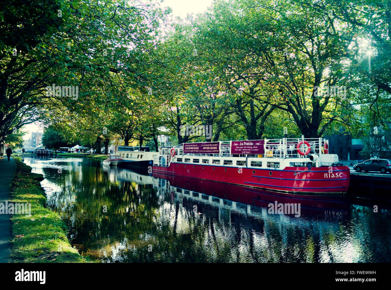 Large traditional barge converted to a bar/restaurant on the Grand ...