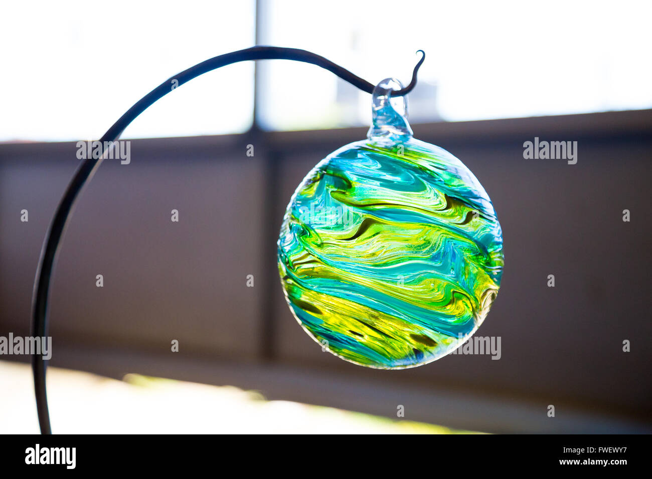 A unique one of a kind glass float was hand blown at a glassblowing ...