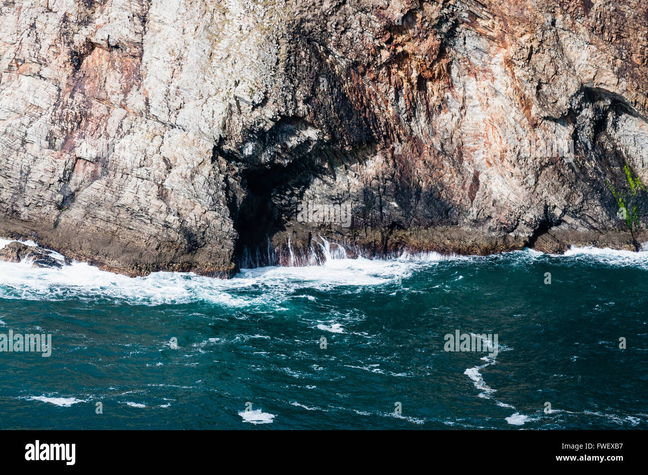 Caves at the bottom of sea cliffs, used in the past for smuggling Stock ...