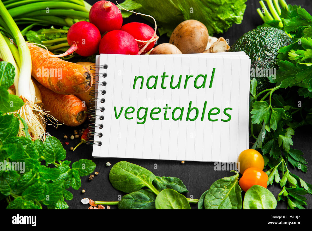 Natural vegetables and greens frame with note, tomatoes, carrots, onion ...