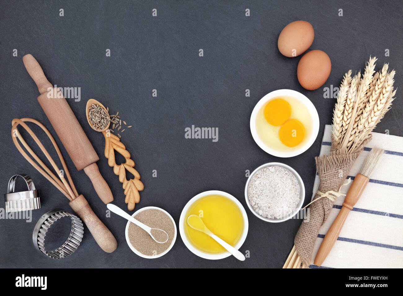 Baking ingredients with kitchen utensils, wheat sheath bundle, flour ...