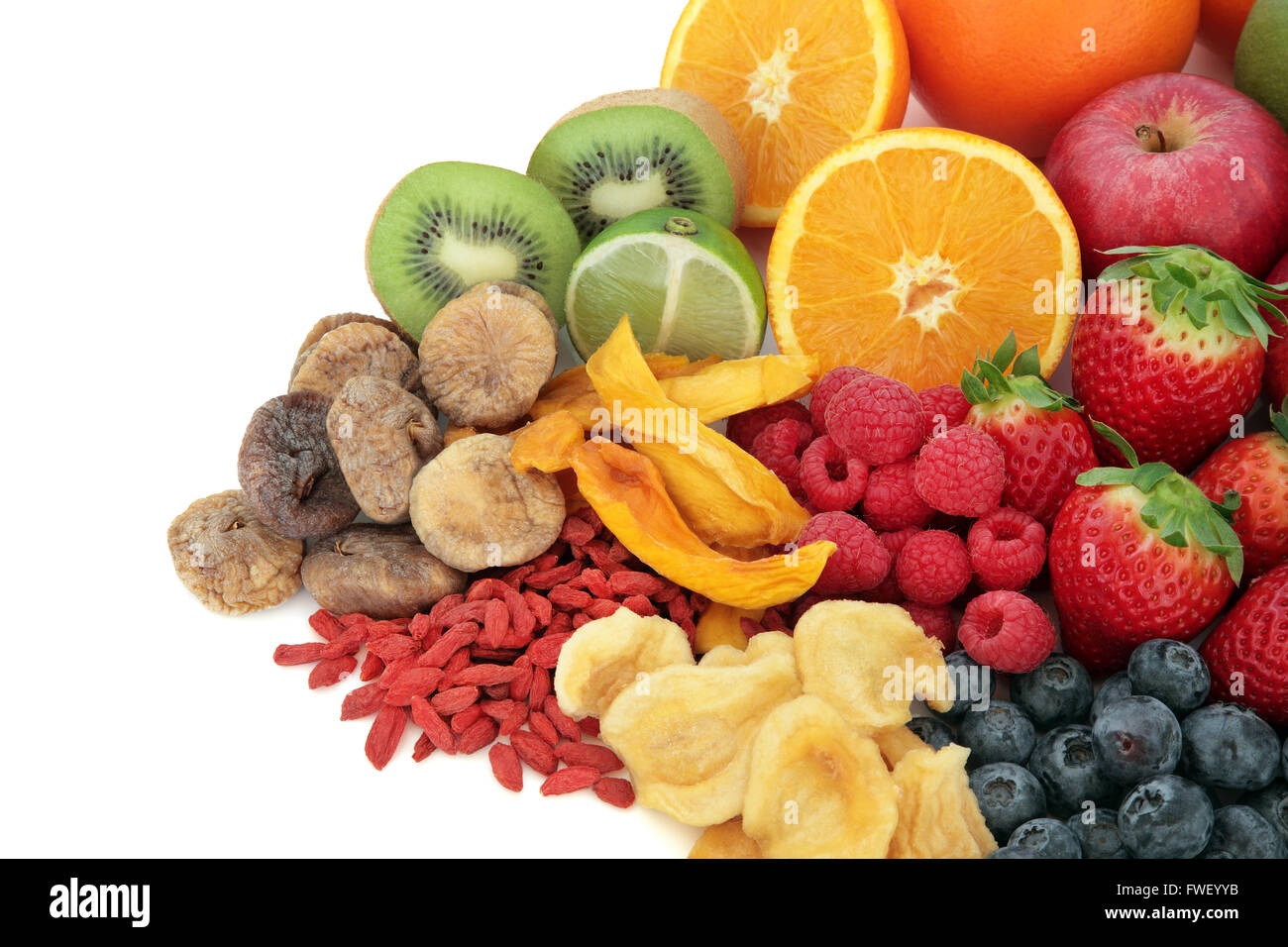 Mixed super food fruit selection over white background with copy space ...