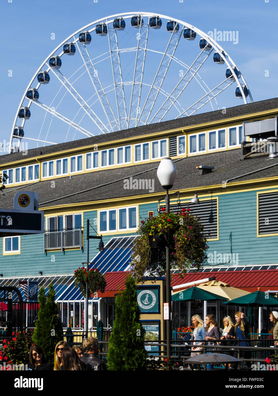 Seattle Great Wheel, a giant Ferris wheel at Pier 57 on Elliott Bay in ...