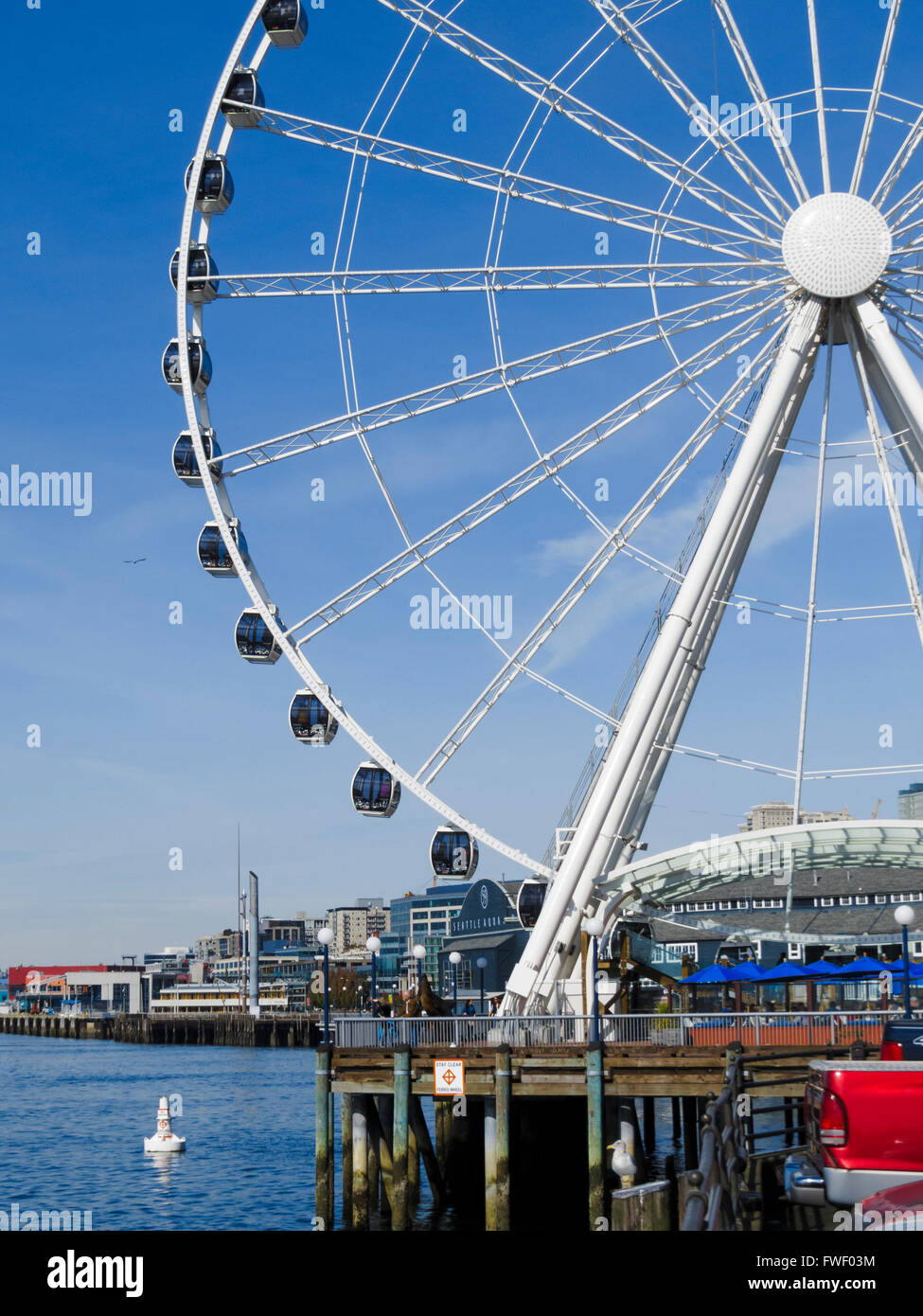 Seattle Great Wheel, a giant Ferris wheel at Pier 57 on Elliott Bay in ...