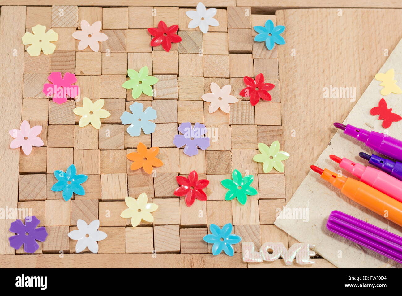 brown wooden blocks with colorful flowers Stock Photo - Alamy
