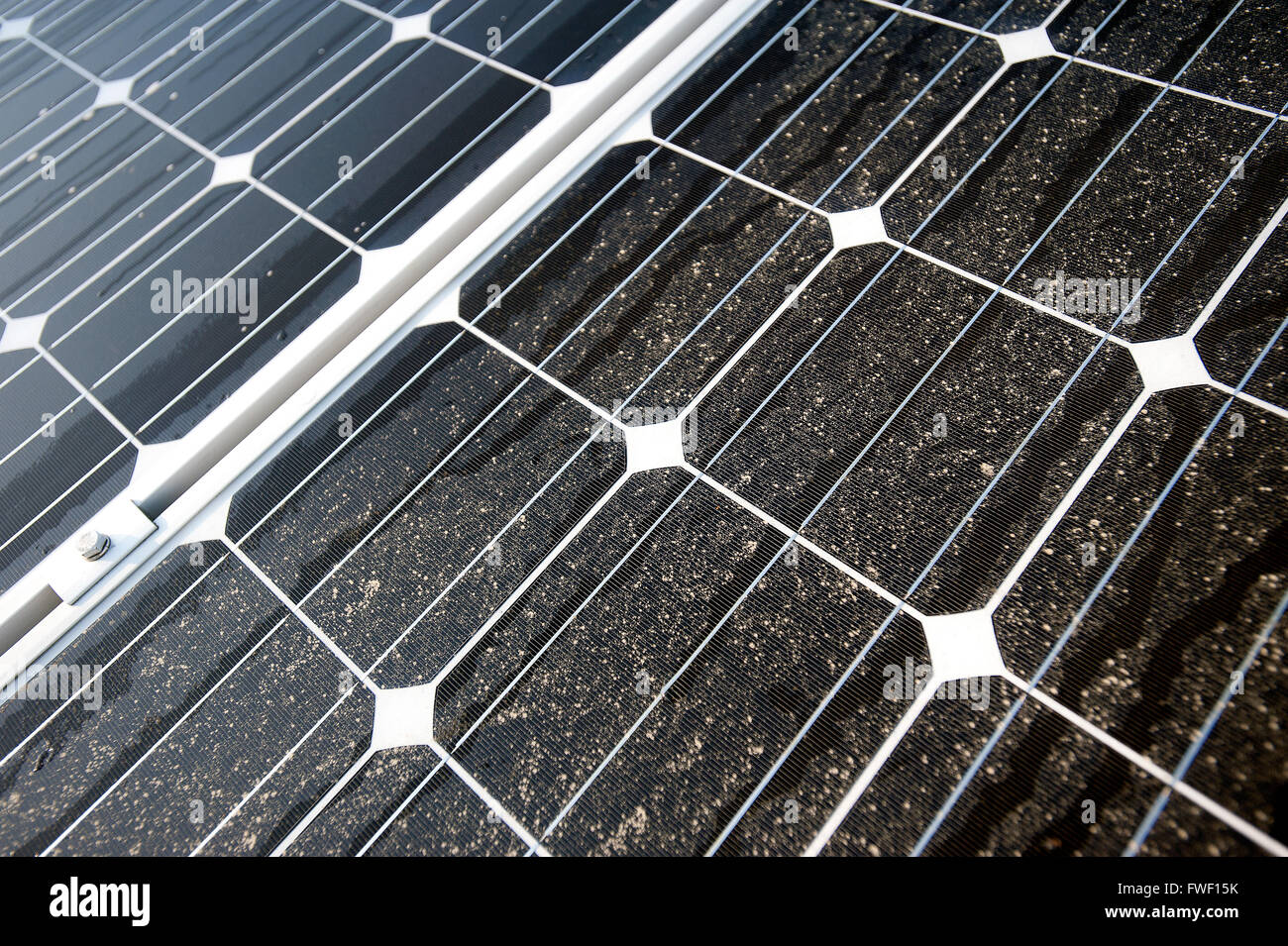 Dirty solar panels covered with pollen Stock Photo - Alamy