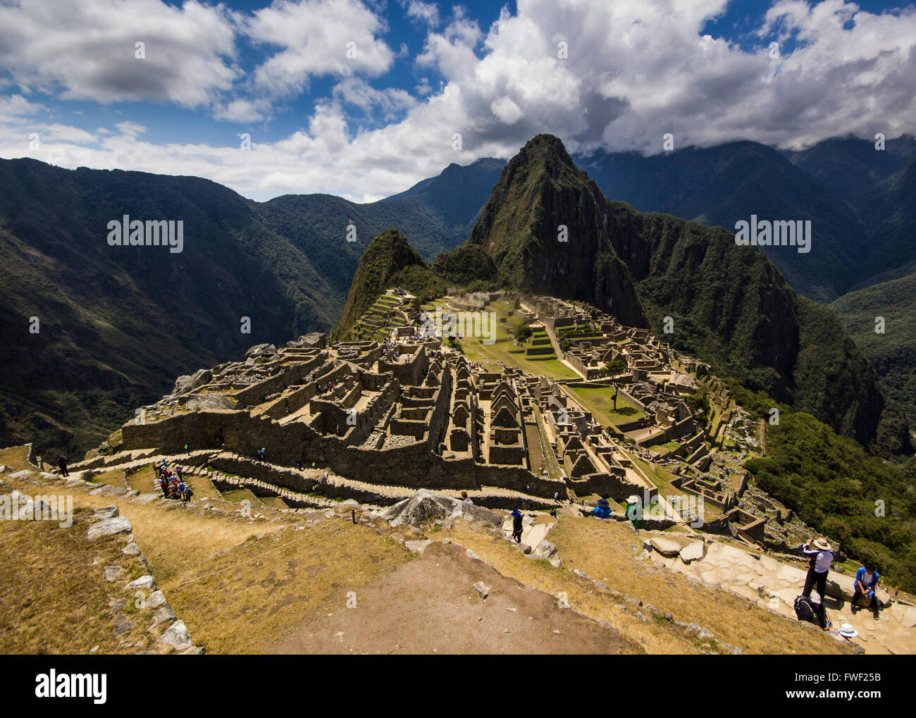 self-portrait of smiling young man in red t-short near old town of ...