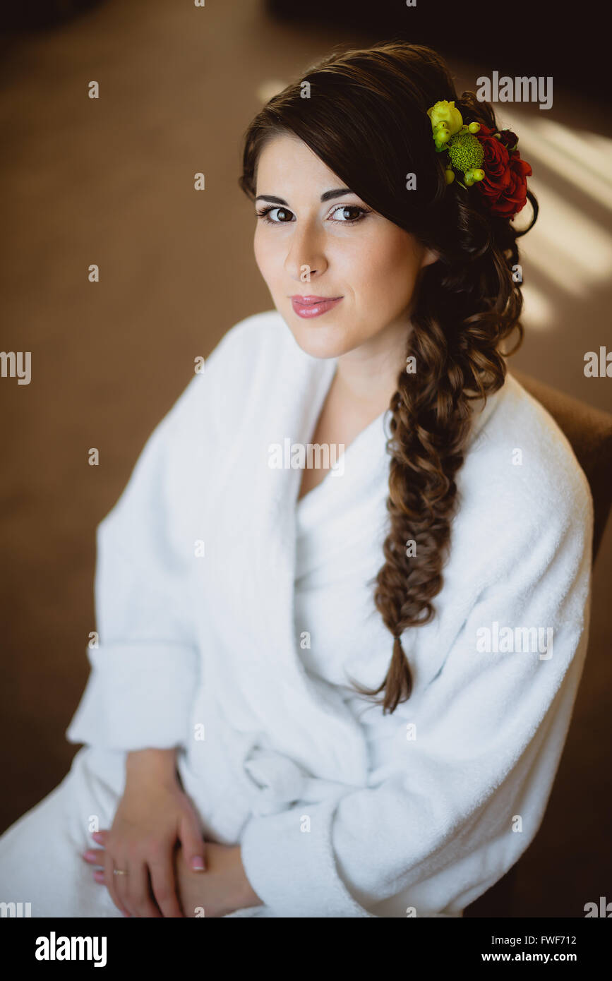 White robe sits hi-res stock photography and images - Alamy