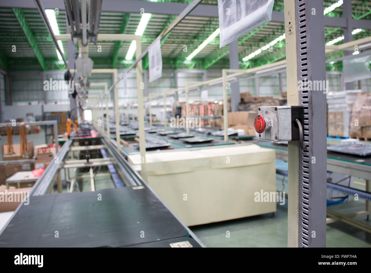 Emergency stop button on the production line Stock Photo - Alamy
