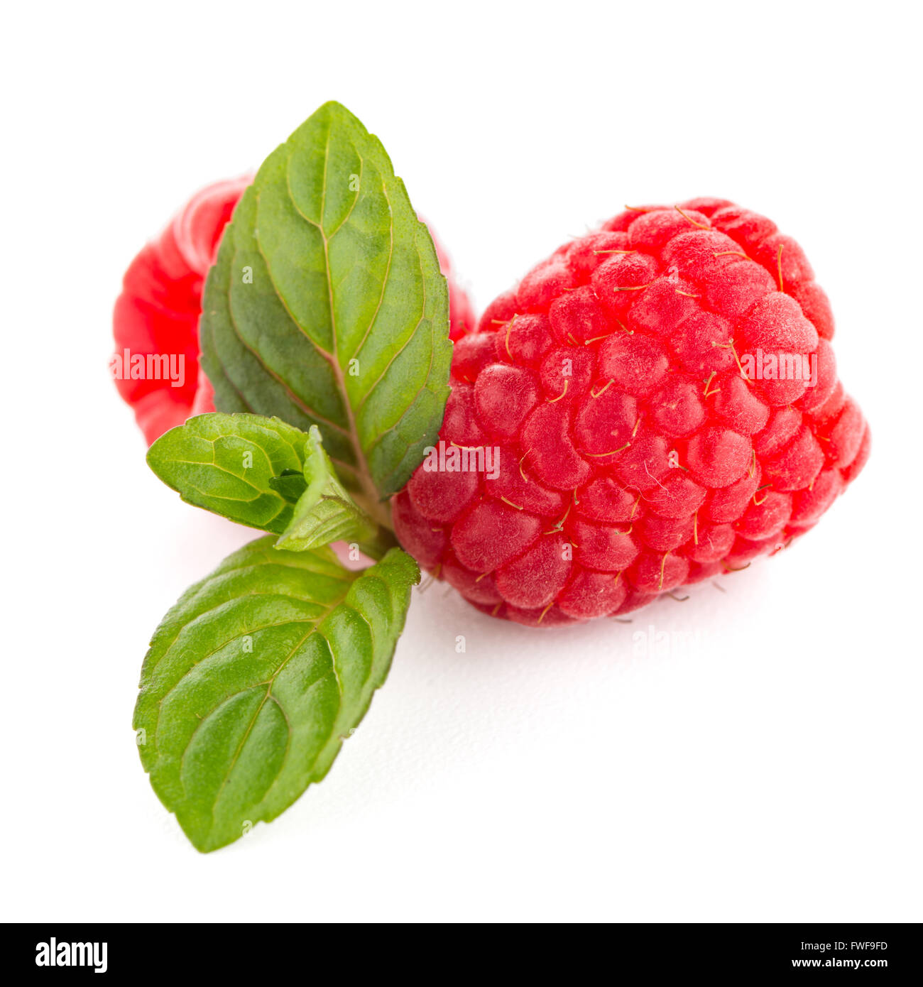 Raspberry fruit isolated over white background Stock Photo - Alamy