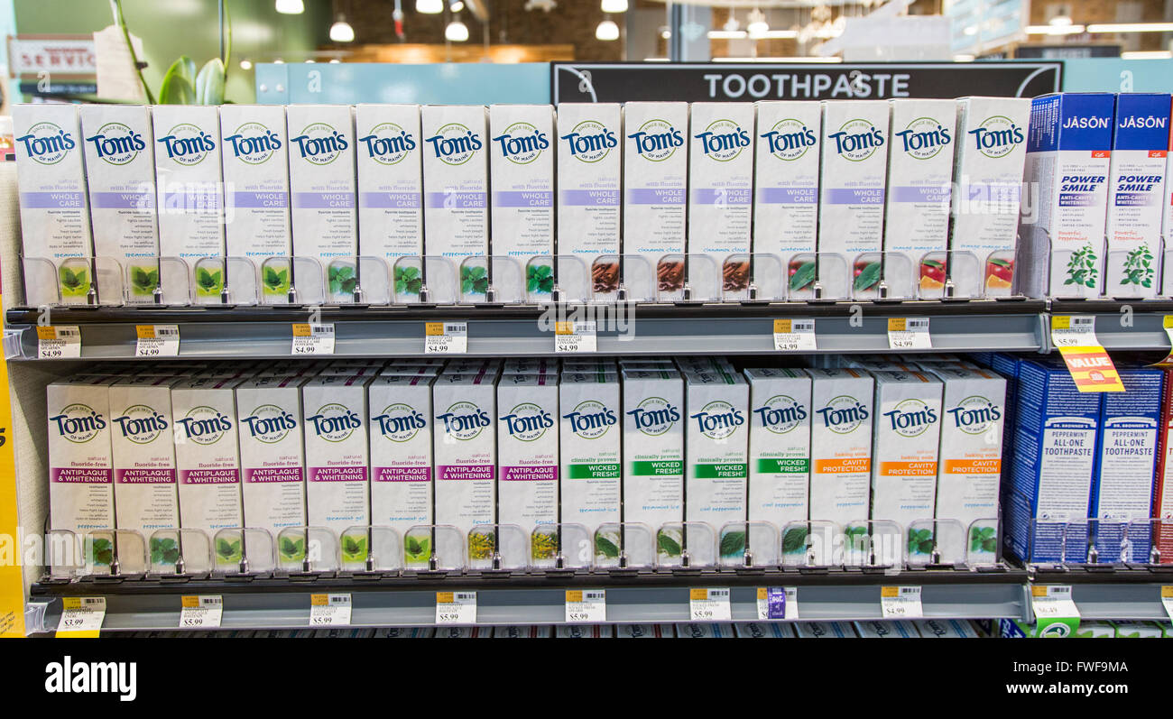 boxes of Tom's of Main natural toothpaste on grocery store shelves ...