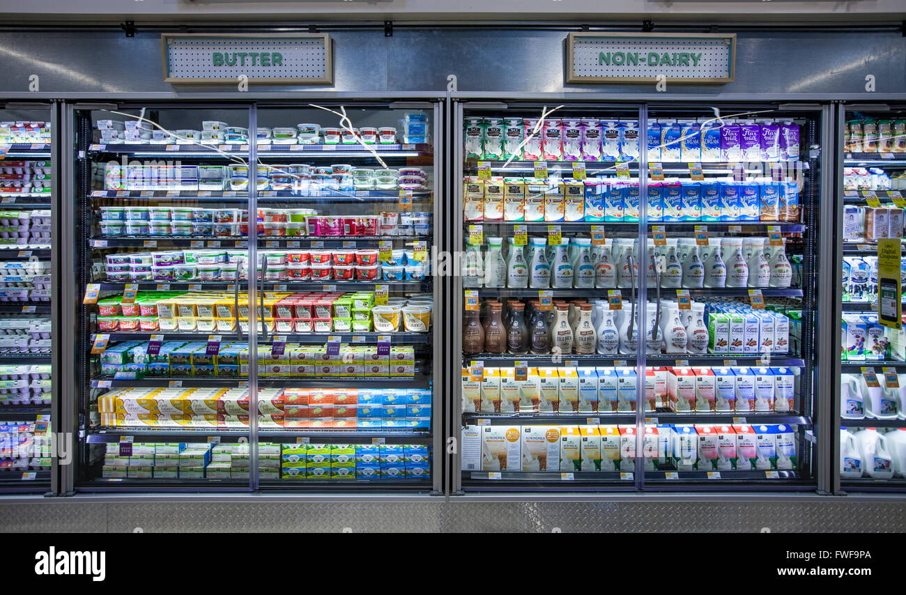 Butter and non-dairy grocery items displayed in a refrigeration case at ...