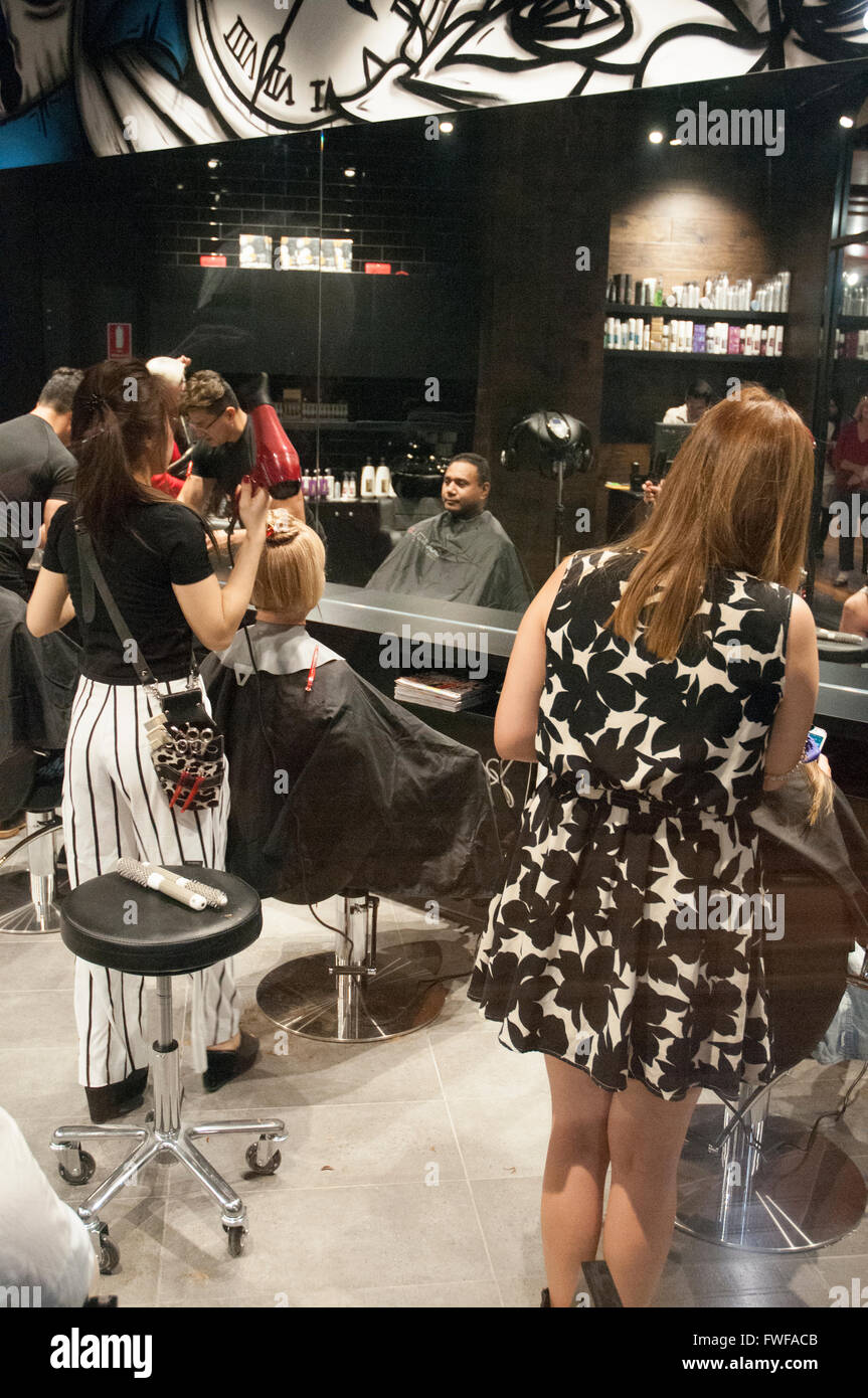 Looking into a busy hairdressing salon at Melbourne Central shopping ...