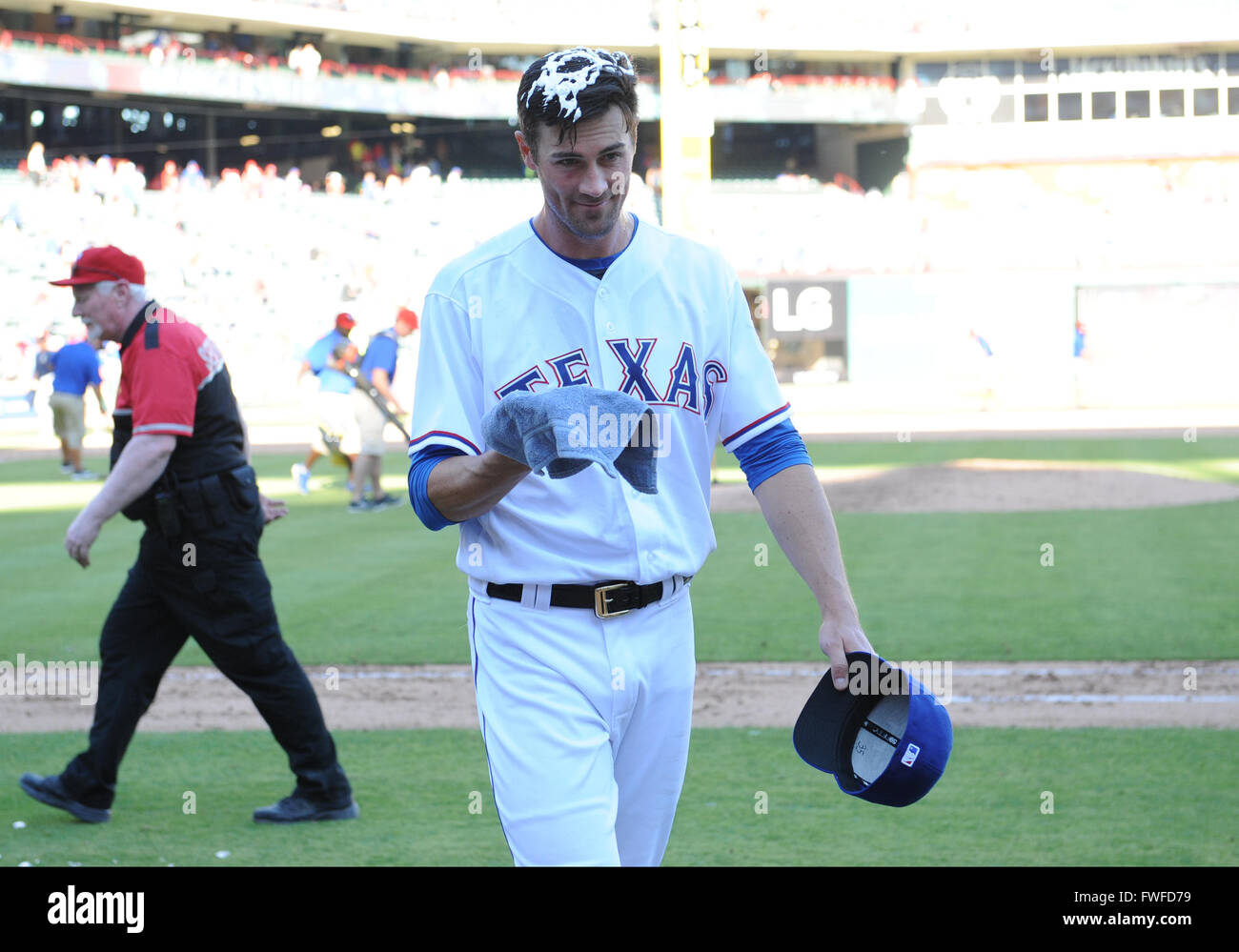 APR 04, 2016: Texas Rangers starting pitcher Cole Hamels #35 has water ...