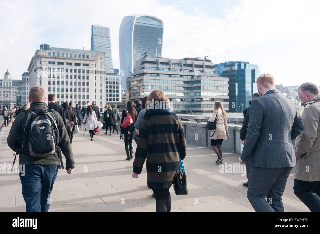 London, UK. 5 April 2016. City of London office commuters en route to ...