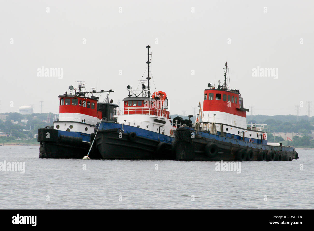Three tug boats moored in Raritan Bay, New Jersey Stock Photo - Alamy