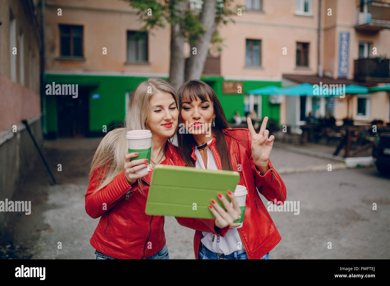 girls with phone Stock Photo - Alamy