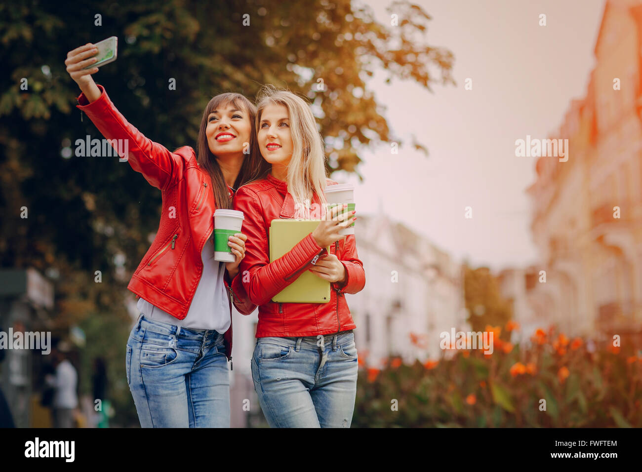 girls with phone Stock Photo - Alamy