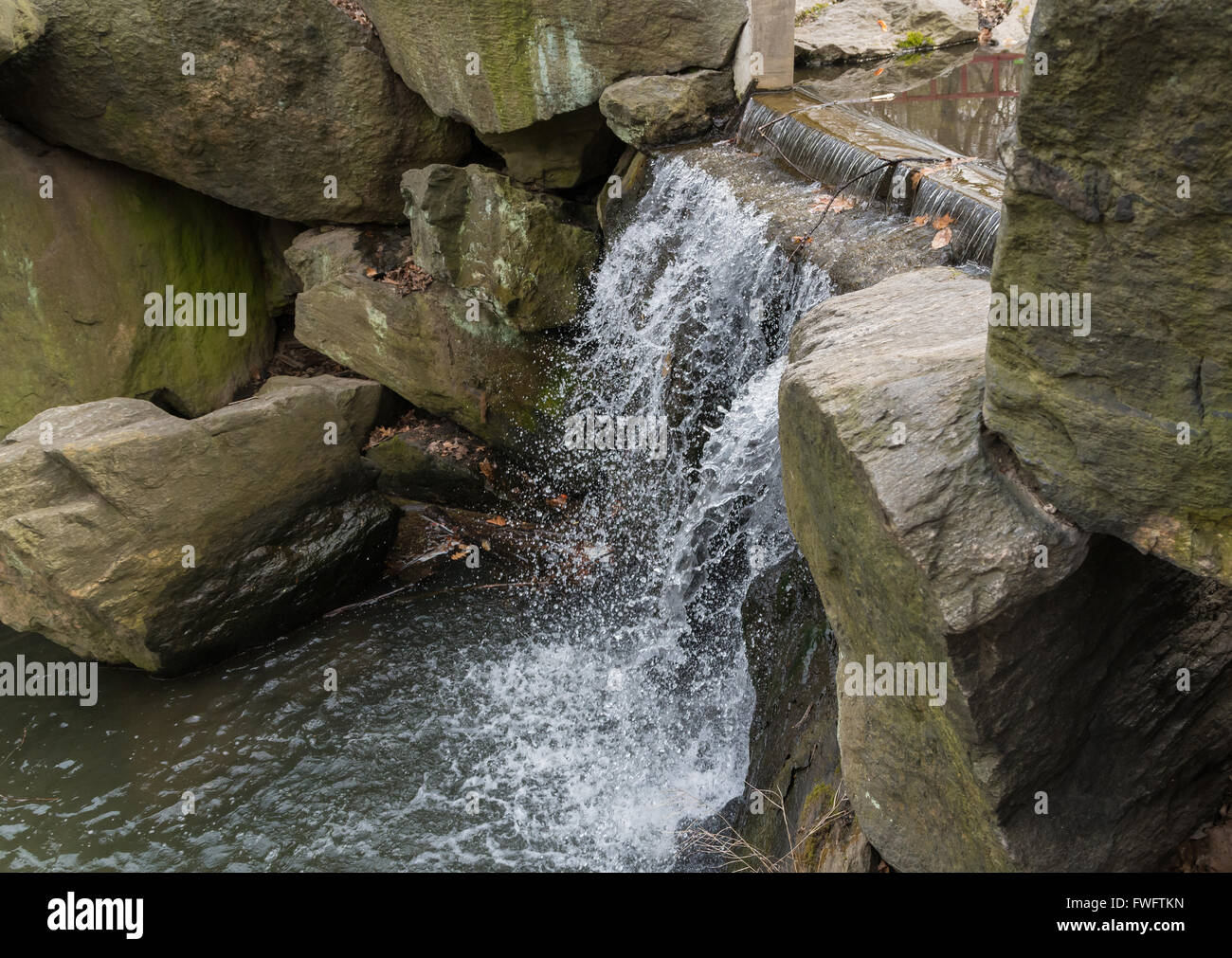 Dam/ waterfall over boulders in The Loch, in northern Central Park, New ...