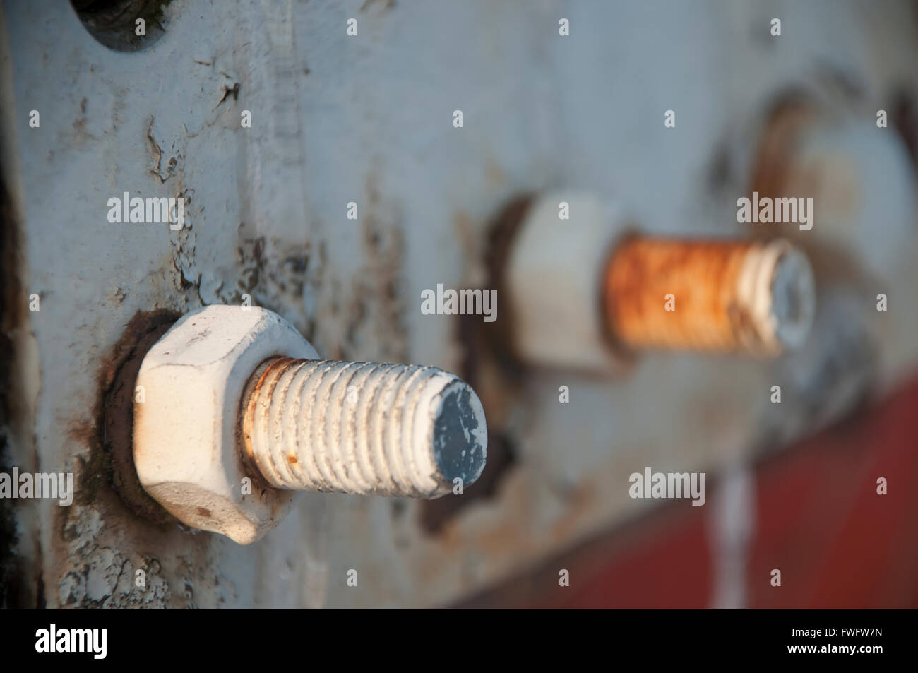 Old rusty screws in the old engine Stock Photo - Alamy