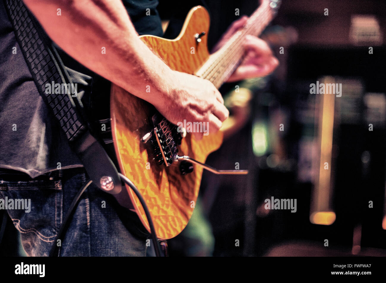 Guys playing rock-and-roll all together. Selective focus Stock Photo ...