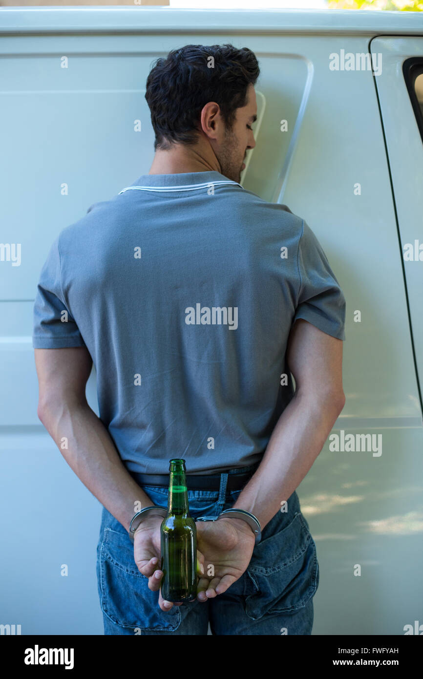 Man hands handcuffed behind back hi-res stock photography and images ...
