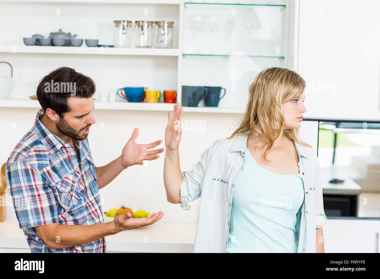 Young couple into an argument Stock Photo - Alamy