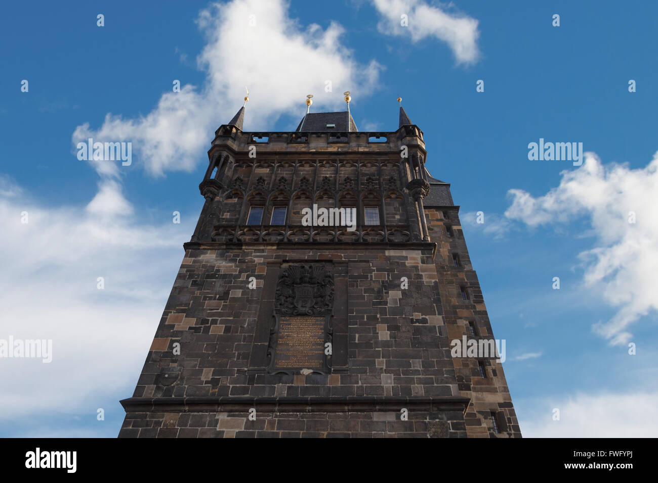 Close up detailed historical gothic stone tower view in Prague, on ...