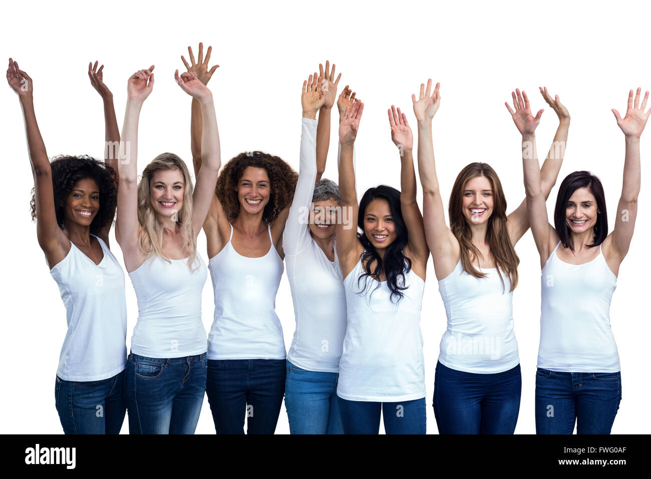 Happy multiethnic women standing with their hands raised Stock Photo ...
