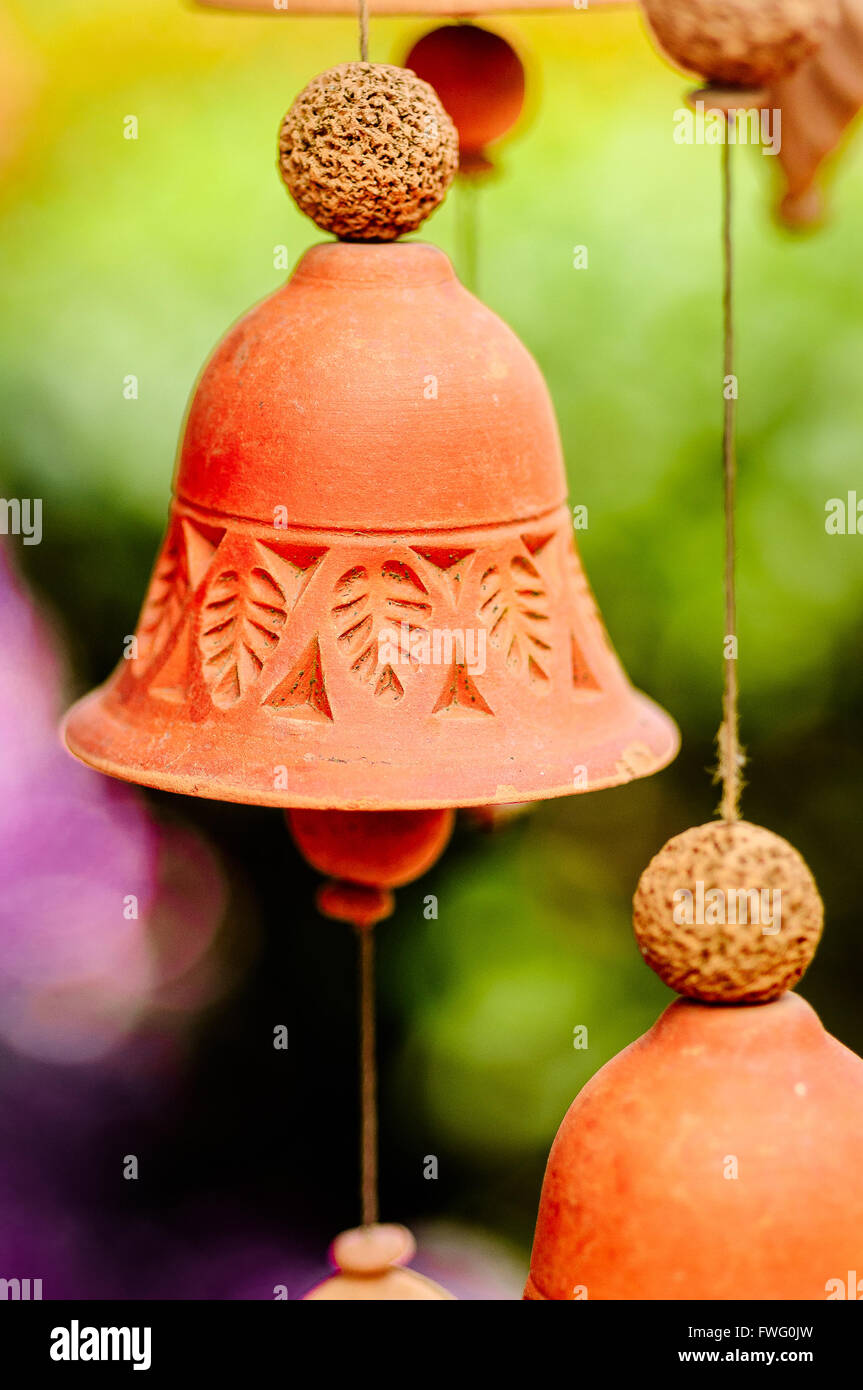 Clay bells hanging Stock Photo - Alamy