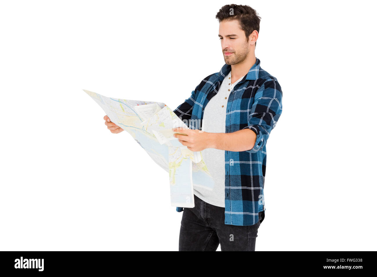Young man looking at map Stock Photo - Alamy