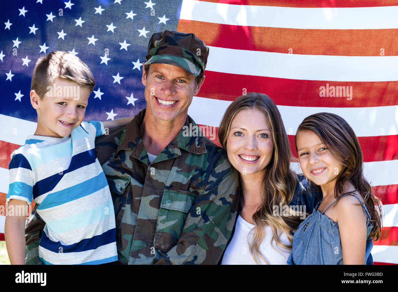 American soldier reunited with his family Stock Photo - Alamy