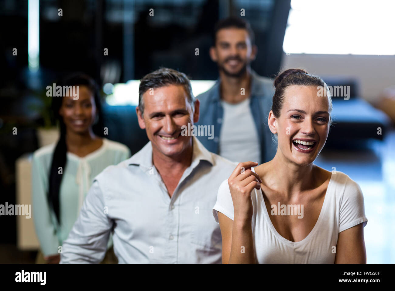 Team of colleagues posing together Stock Photo - Alamy