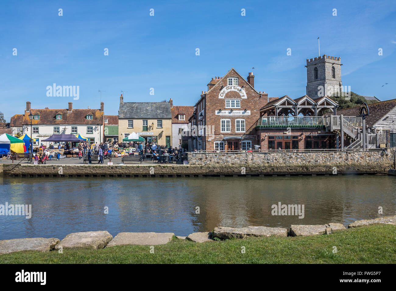 England Dorset Wareham The River Frome showing the church of Lady St ...