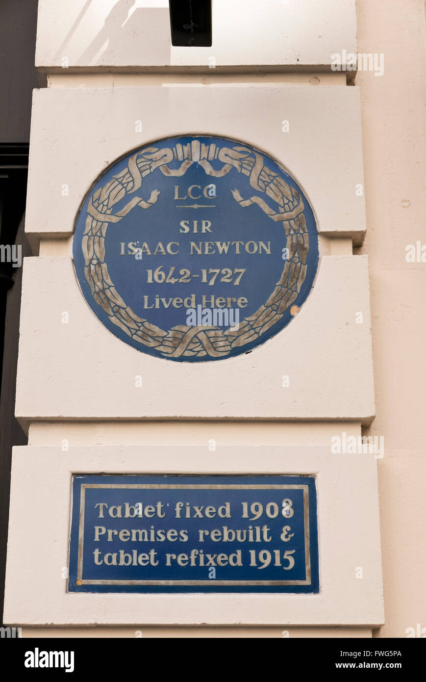 A commemorative plaque of Isaac Newton on the wall of a building in ...